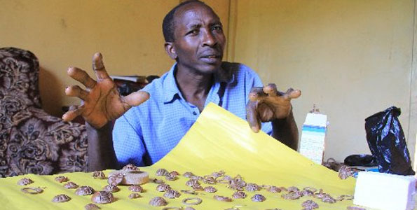 Form Two drop-out carves craft niche in macadamia shells - Business Daily