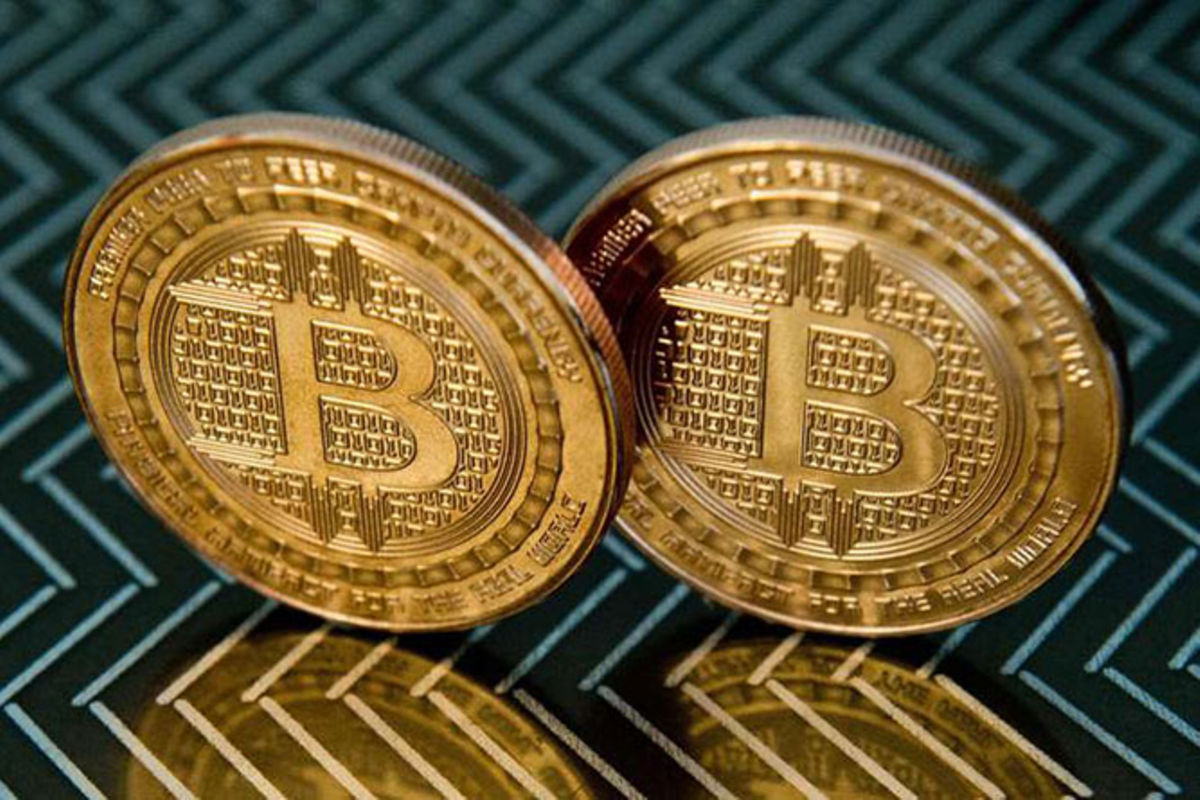 Bitcoin frenzy settles down as big players muscle into market ...