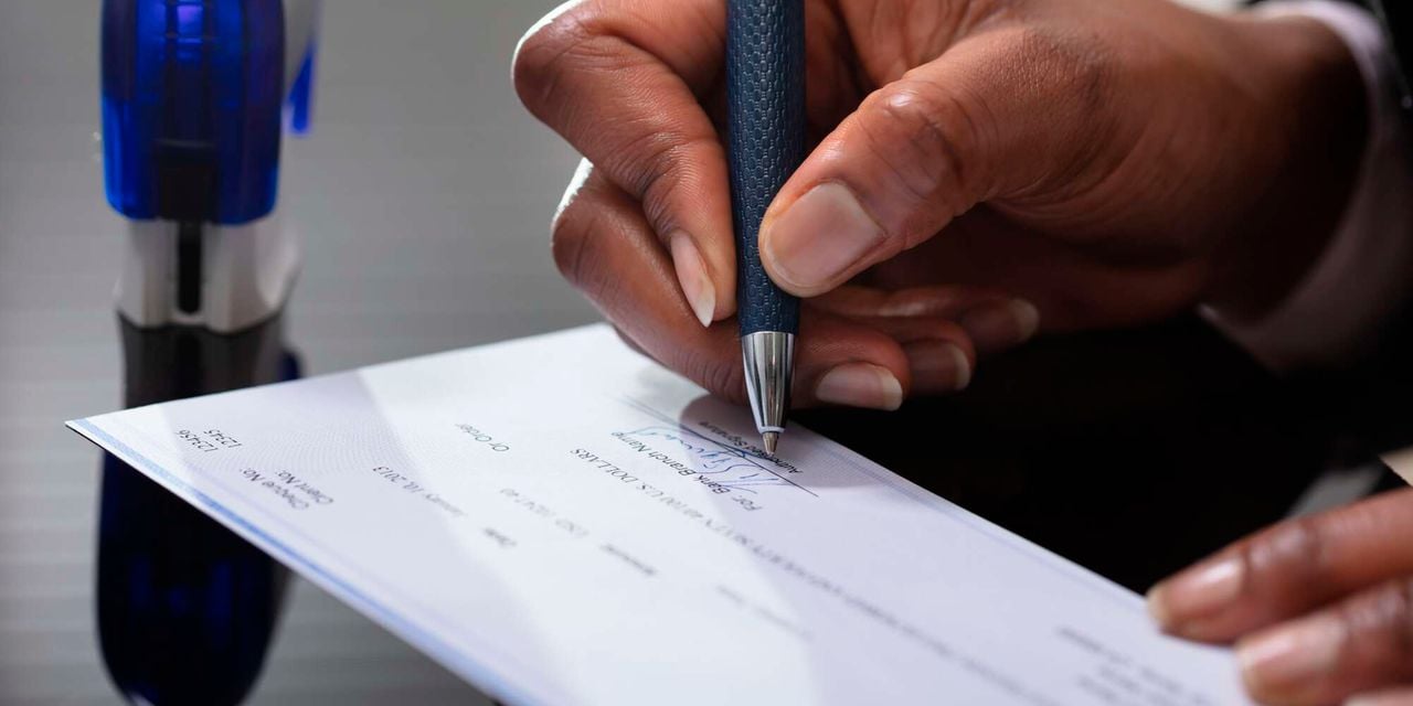 Kenyans cling to cheques as Africa peers move on - Business Daily